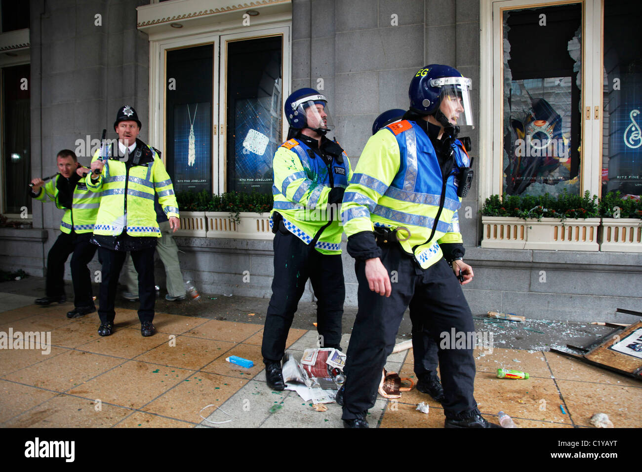 Riot police as anti capitalists attack The Ritz hotel in central London ...