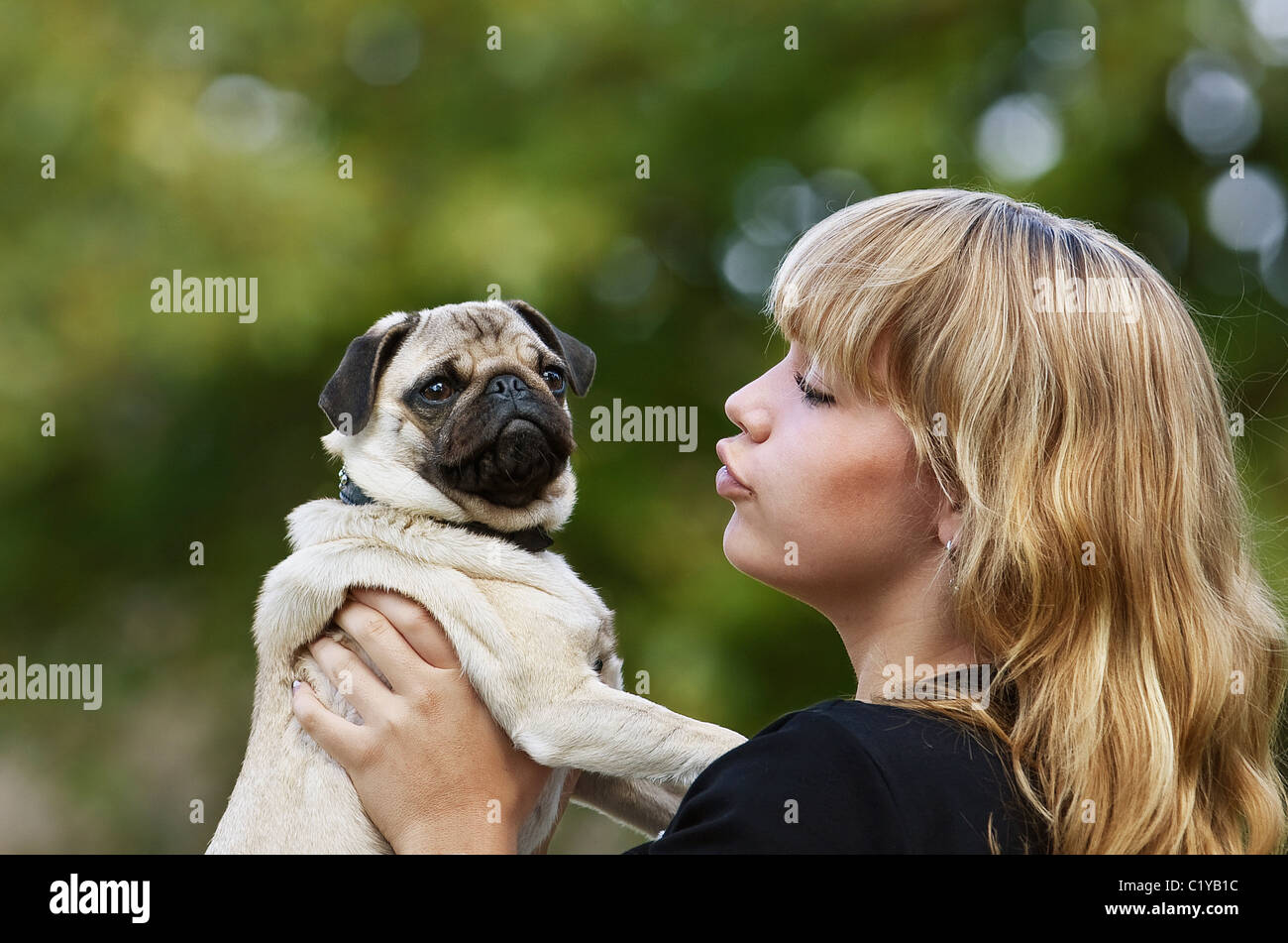 girl and pug Stock Photo - Alamy