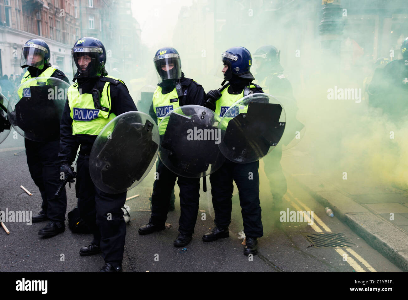 Riot police as anti capitalists go on the rampage through central ...
