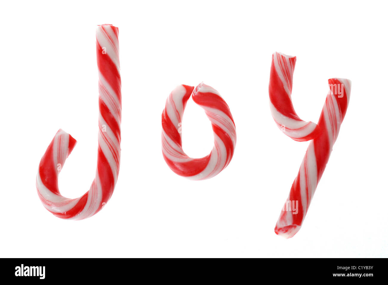 The word ' Joy ' spelled with candy canes Stock Photo - Alamy