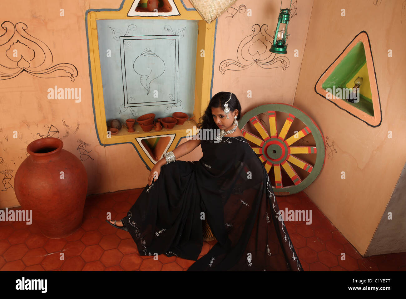 a model clad in fashionable sari and silver jewelery Stock Photo - Alamy