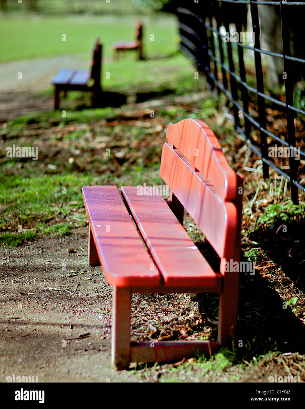 red park bench Stock Photo - Alamy