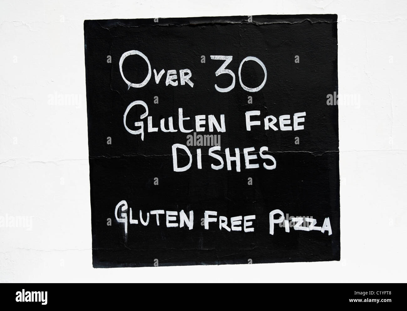 Menu offering gluten free dishes and pizzas Stock Photo - Alamy