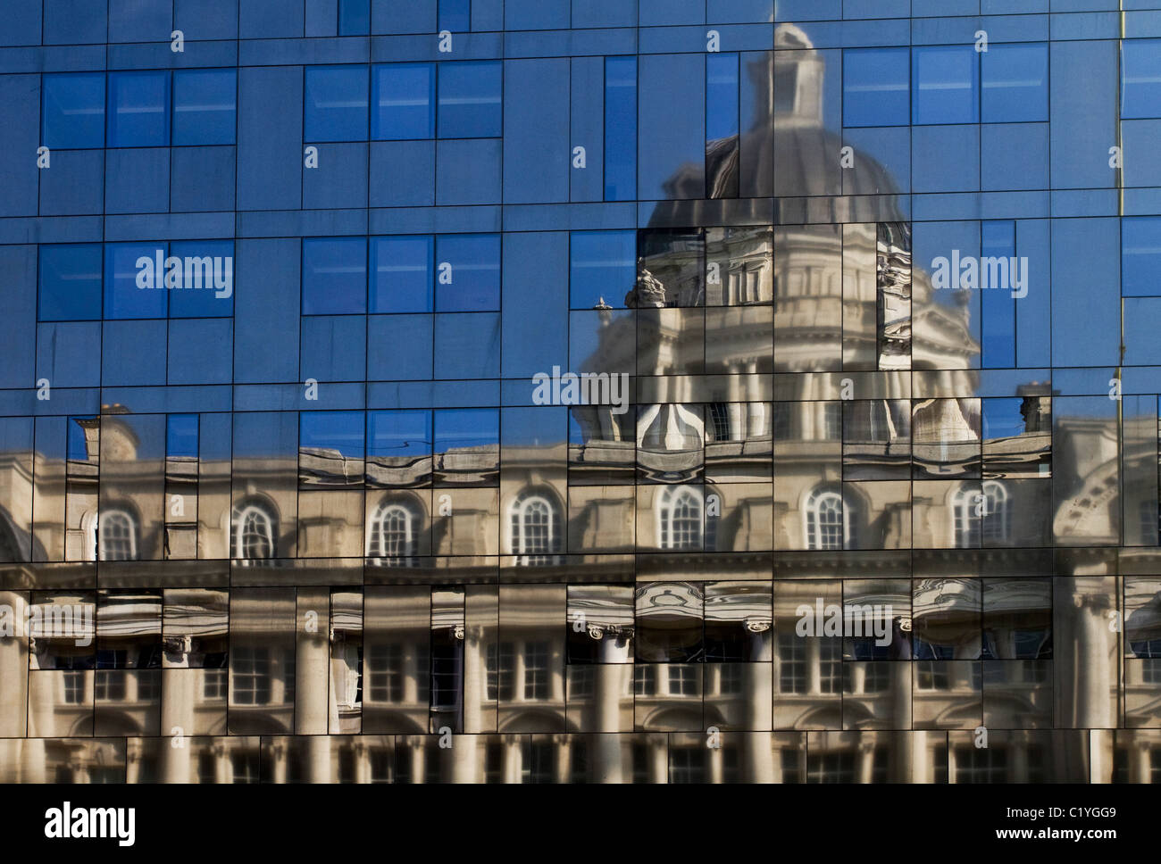 Modern design Glass-walled Building with Reflections of the Port of ...