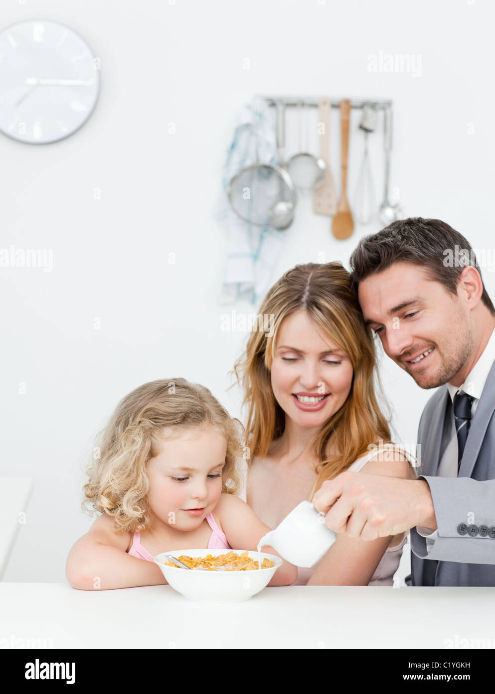 Family having breakfast together Stock Photo - Alamy