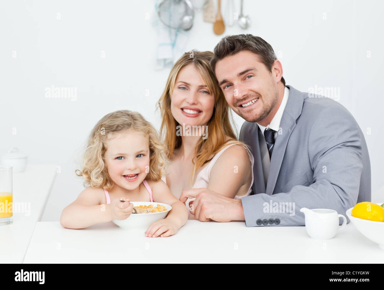 Family having breakfast together Stock Photo - Alamy