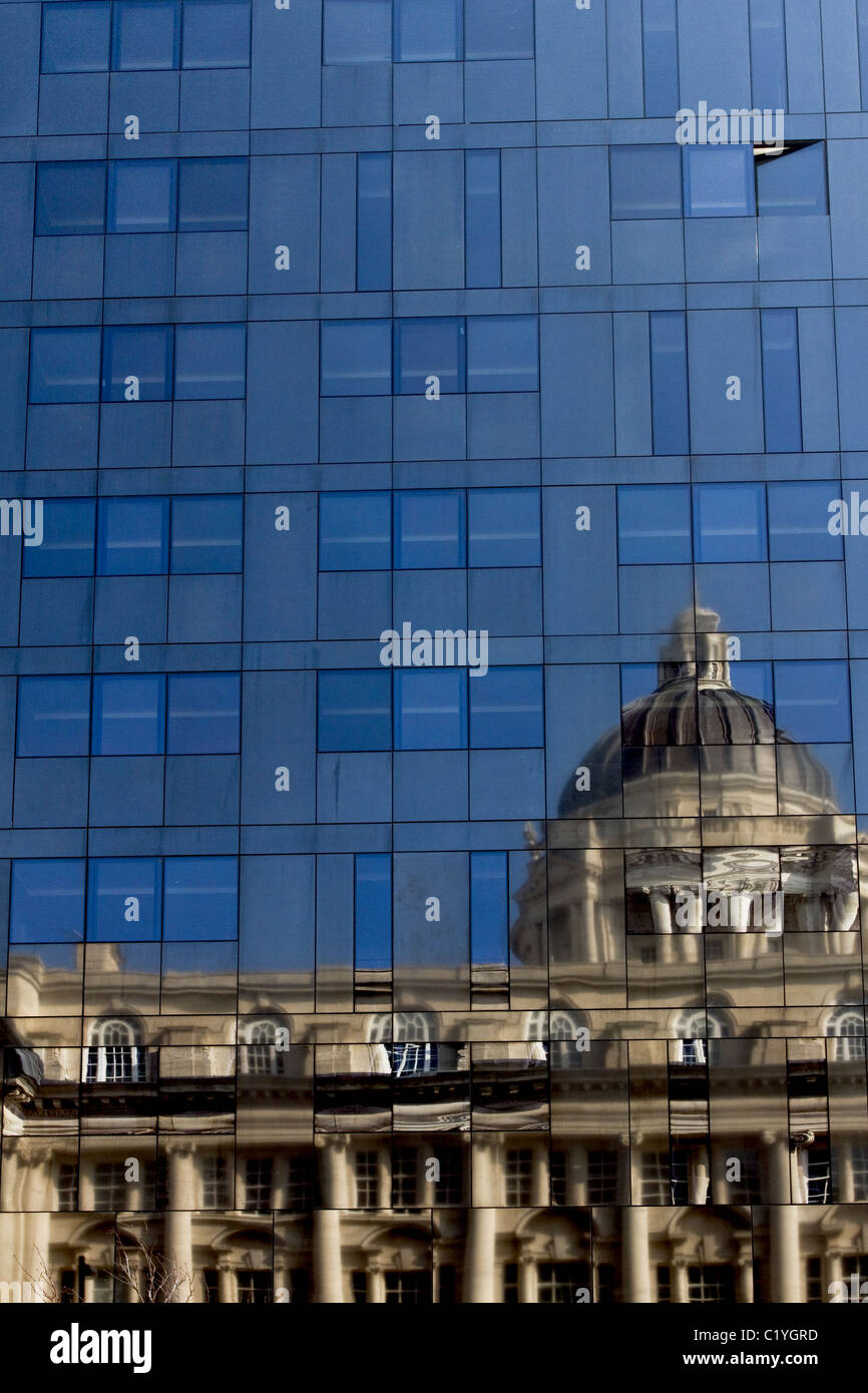 Modern design Glass-walled Building with Reflections of the Port of ...