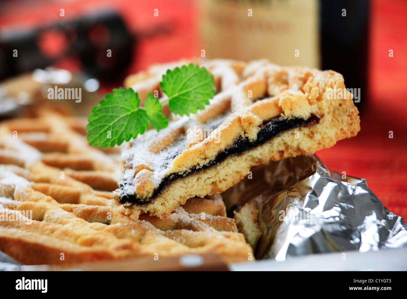 Lattice topped tart with damson cheese filling Stock Photo - Alamy
