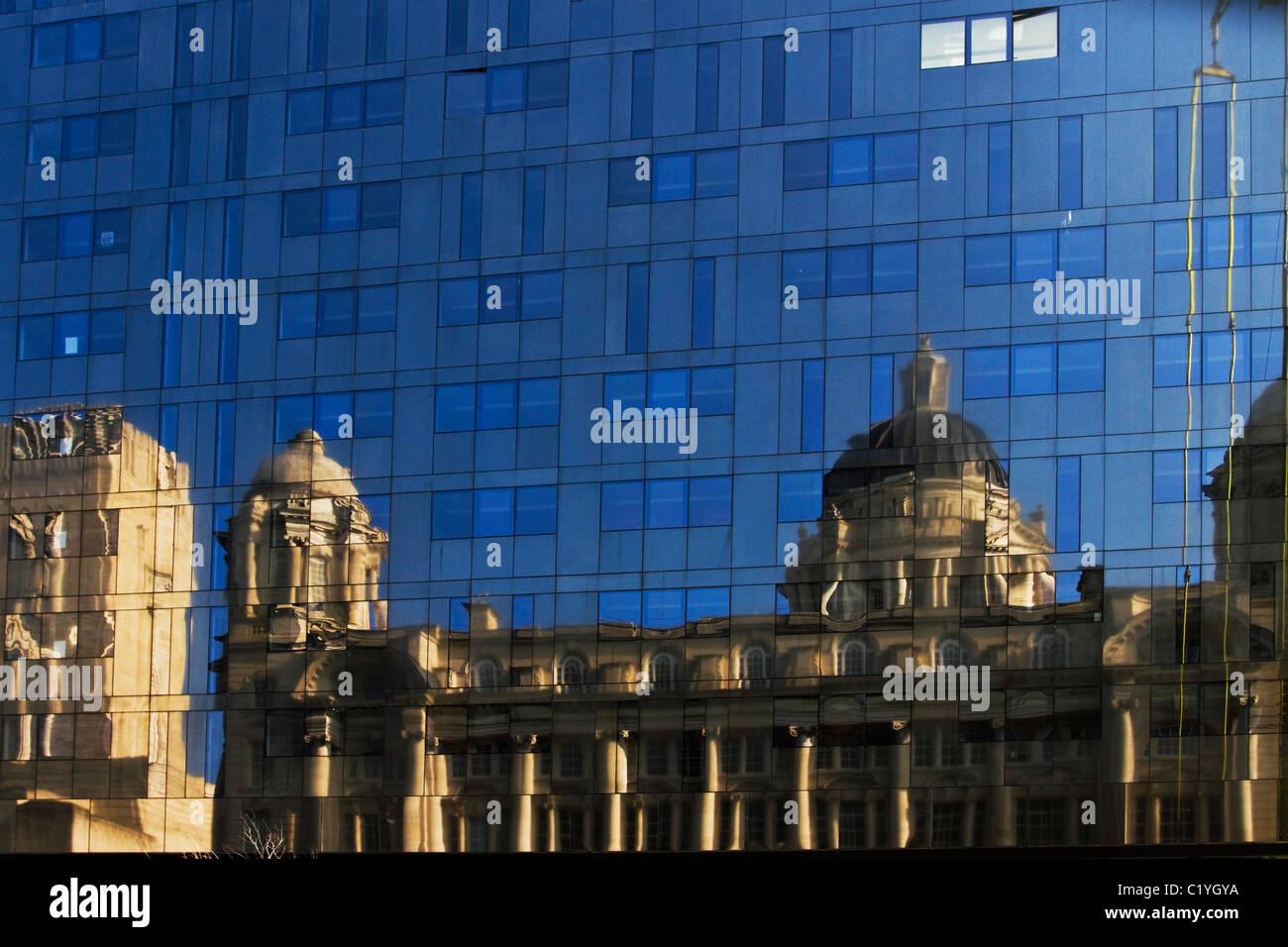 Modern design Glass-walled Building with Reflections of the Port of ...
