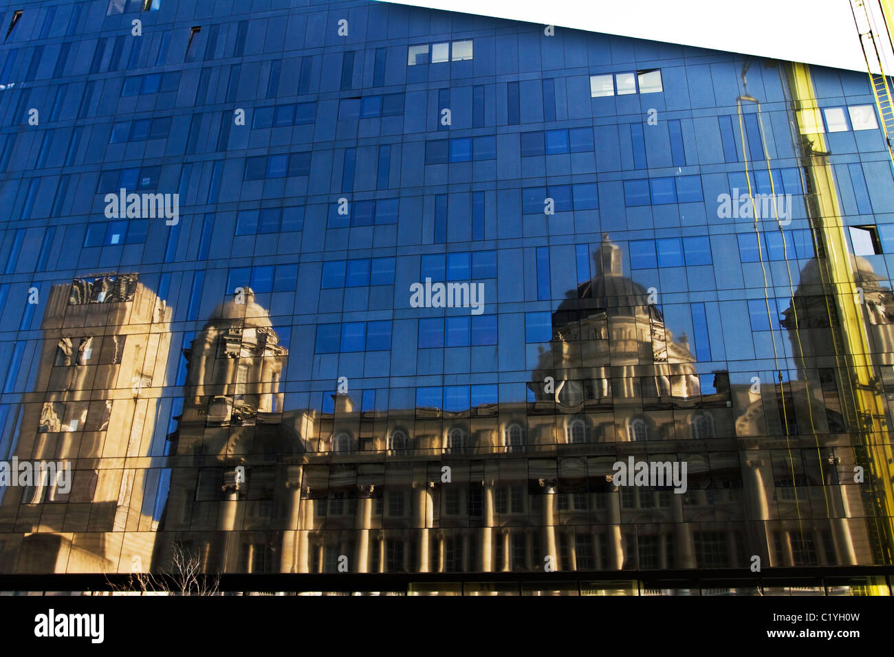Modern design Glass-walled Building with Reflections of the Port of ...