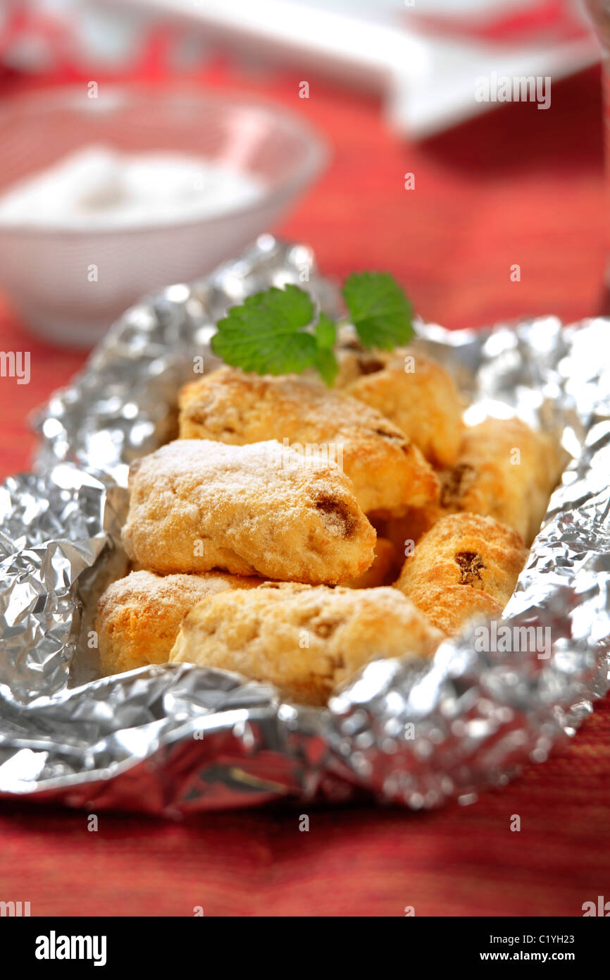 Mini marzipan stollen cakes in aluminum foil Stock Photo - Alamy