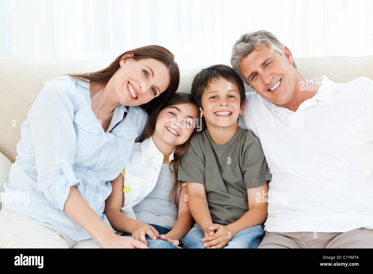 Portrait of a smiling family Stock Photo - Alamy