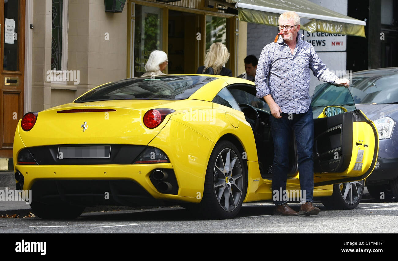 Chris Evans parks his new yellow Ferrari and heads off to meet friends ...