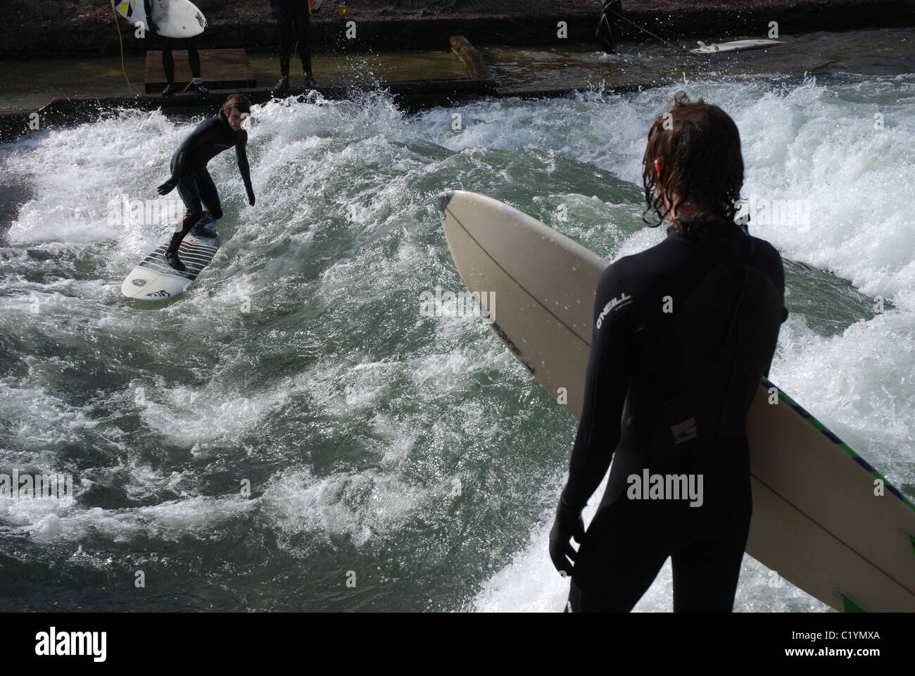 Surfing at Eisbach Munich in the River Stock Photo - Alamy
