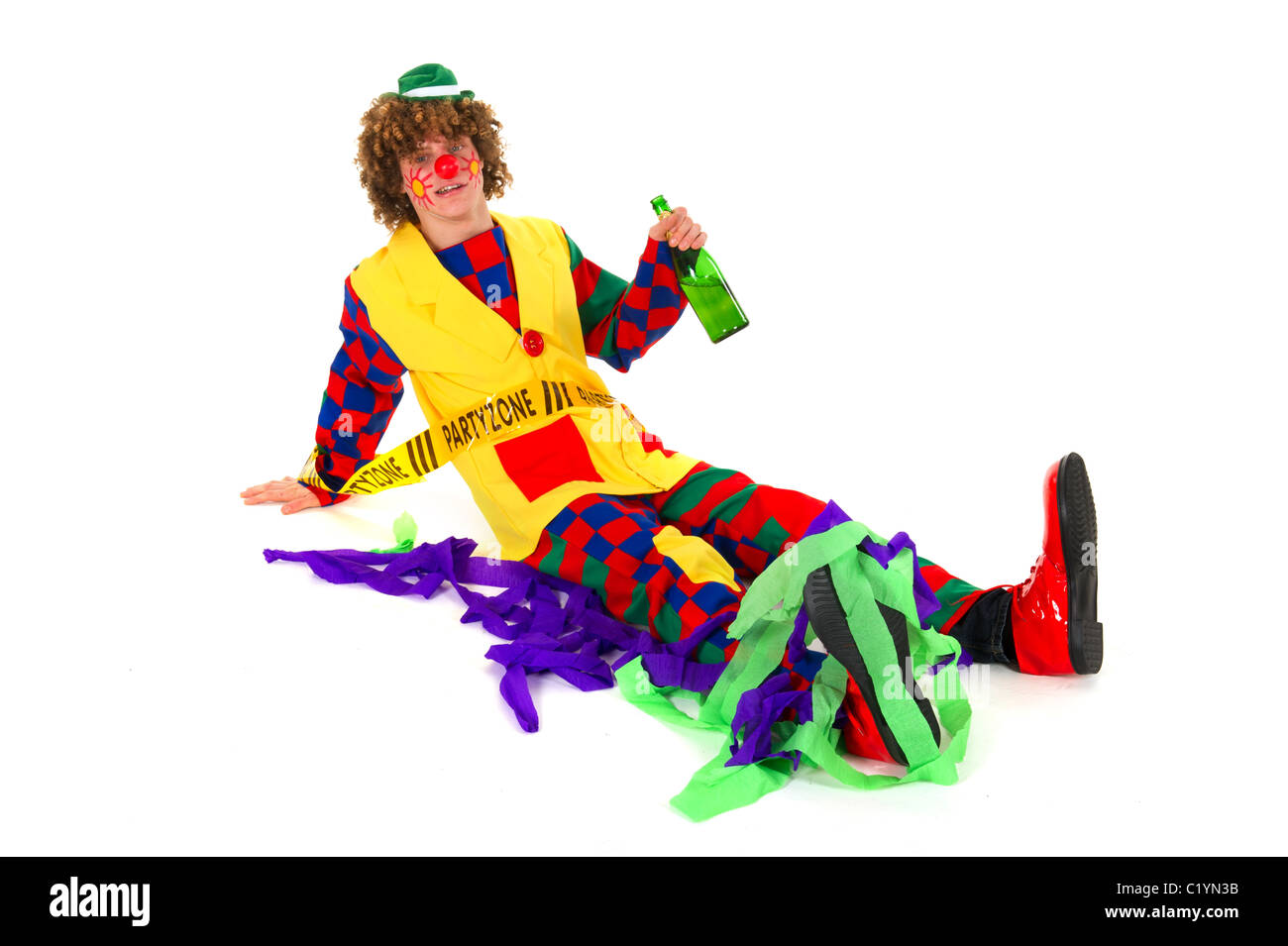 Clown is drinking with a bottle of wine Stock Photo - Alamy