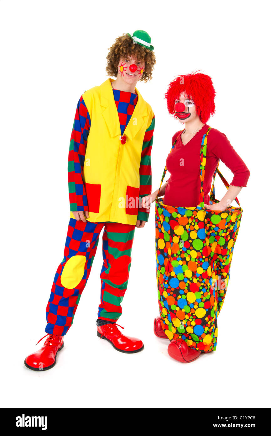 Couple funny full dressed clowns in the studio Stock Photo - Alamy