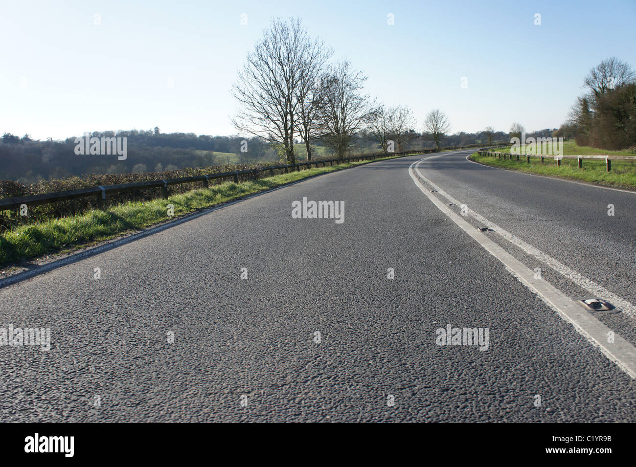 Curved road in Surrey Stock Photo - Alamy