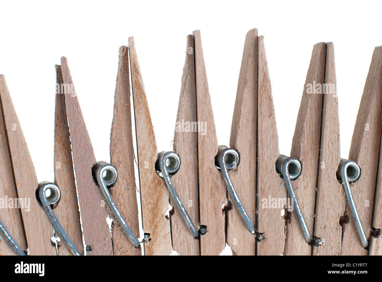 Wooden clothes pegs isolated on white background Stock Photo - Alamy