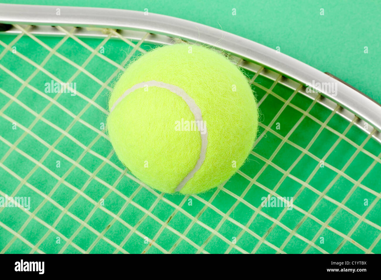 a tennis ball and racket Stock Photo - Alamy