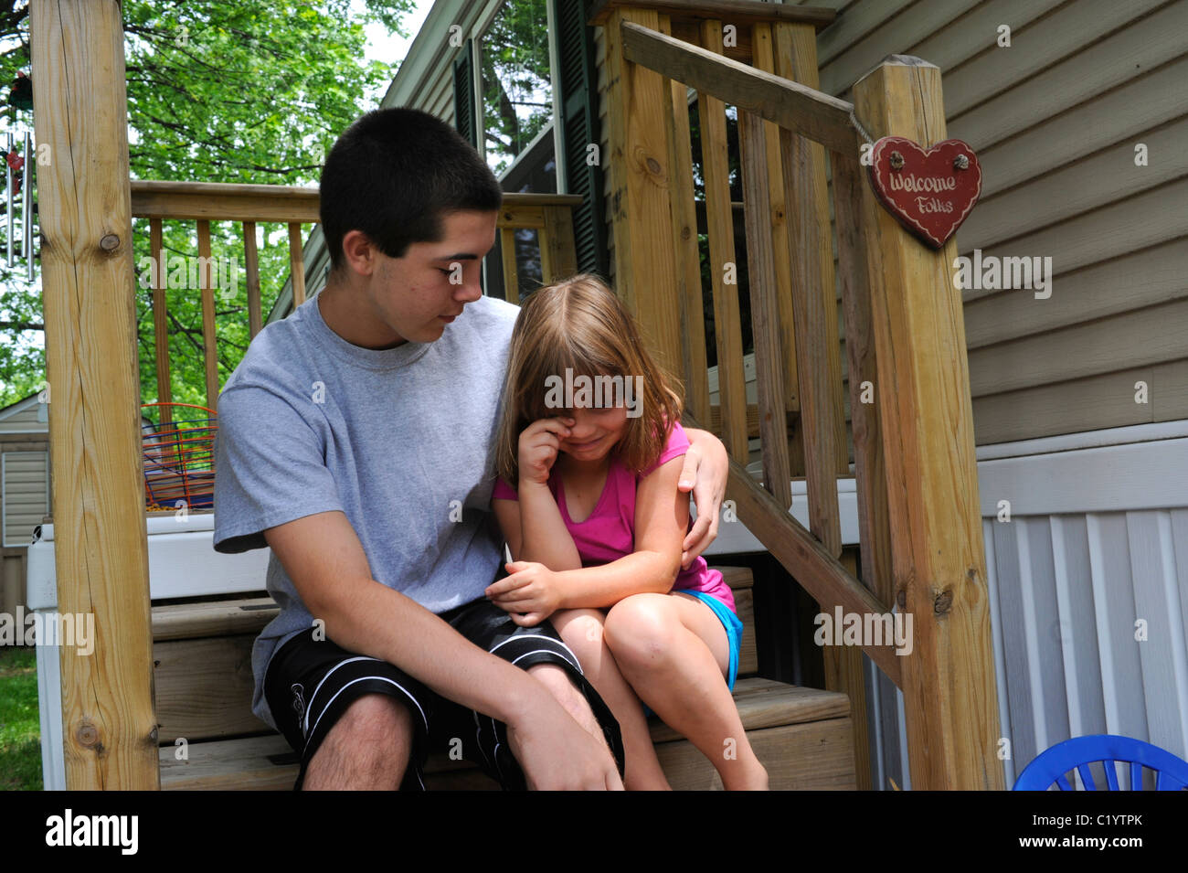 Boy consoling his brother hi-res stock photography and images - Alamy