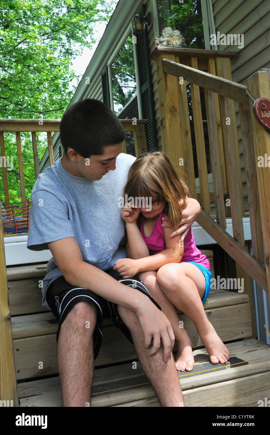 Boy Consoling His Brother Stock Photos & Boy Consoling His Brother ...