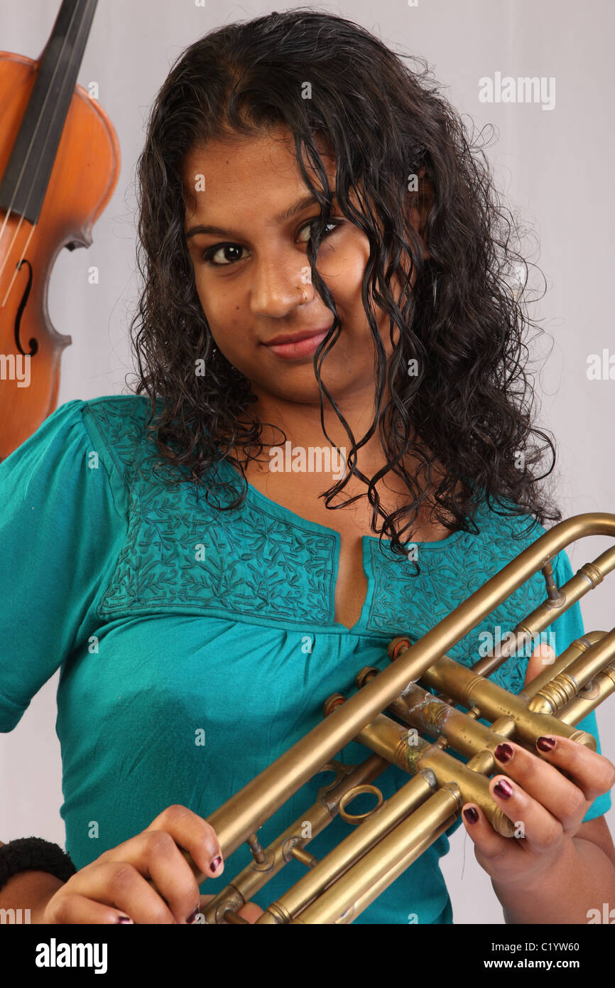 an Indian model posing with bugle in hand Stock Photo - Alamy