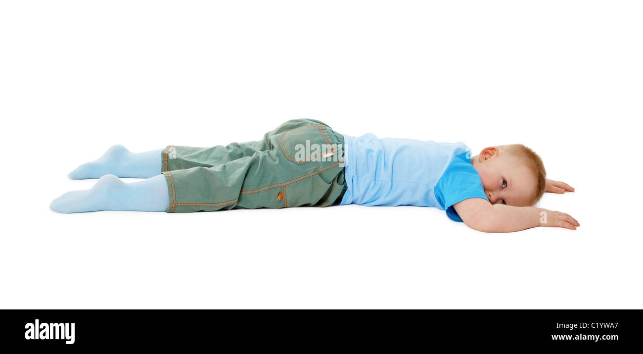 The child stumbled, fell and lay isolated on white background Stock ...