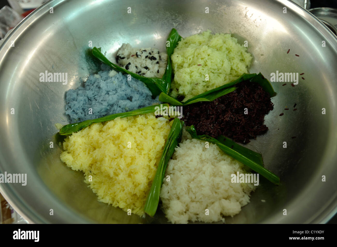 assorted coloured rice for thai desserts , food court , bangkok ...