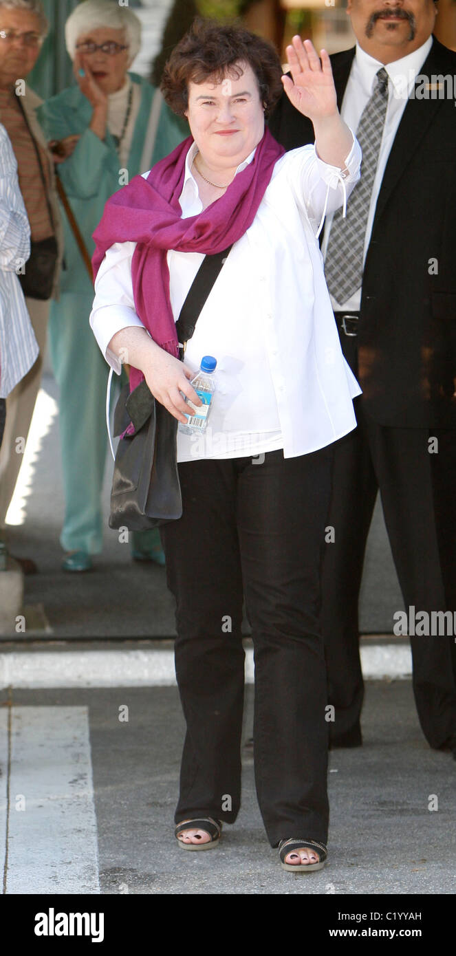 Susan Boyle poses for photographers as she arrives at her hotel. Los ...