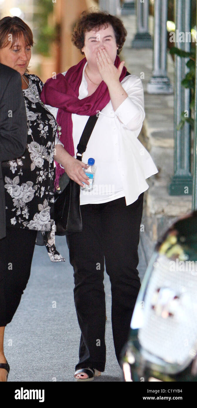 Susan Boyle poses for photographers as she arrives at her hotel. Los ...