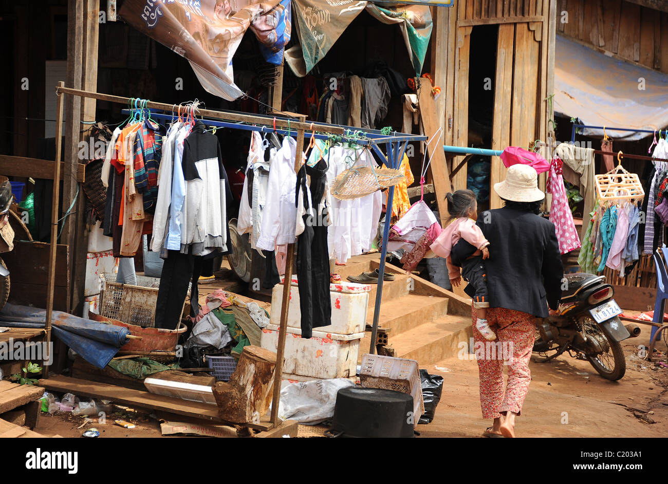 Happy dad carries serious podgy cute son Stock Photo - Alamy