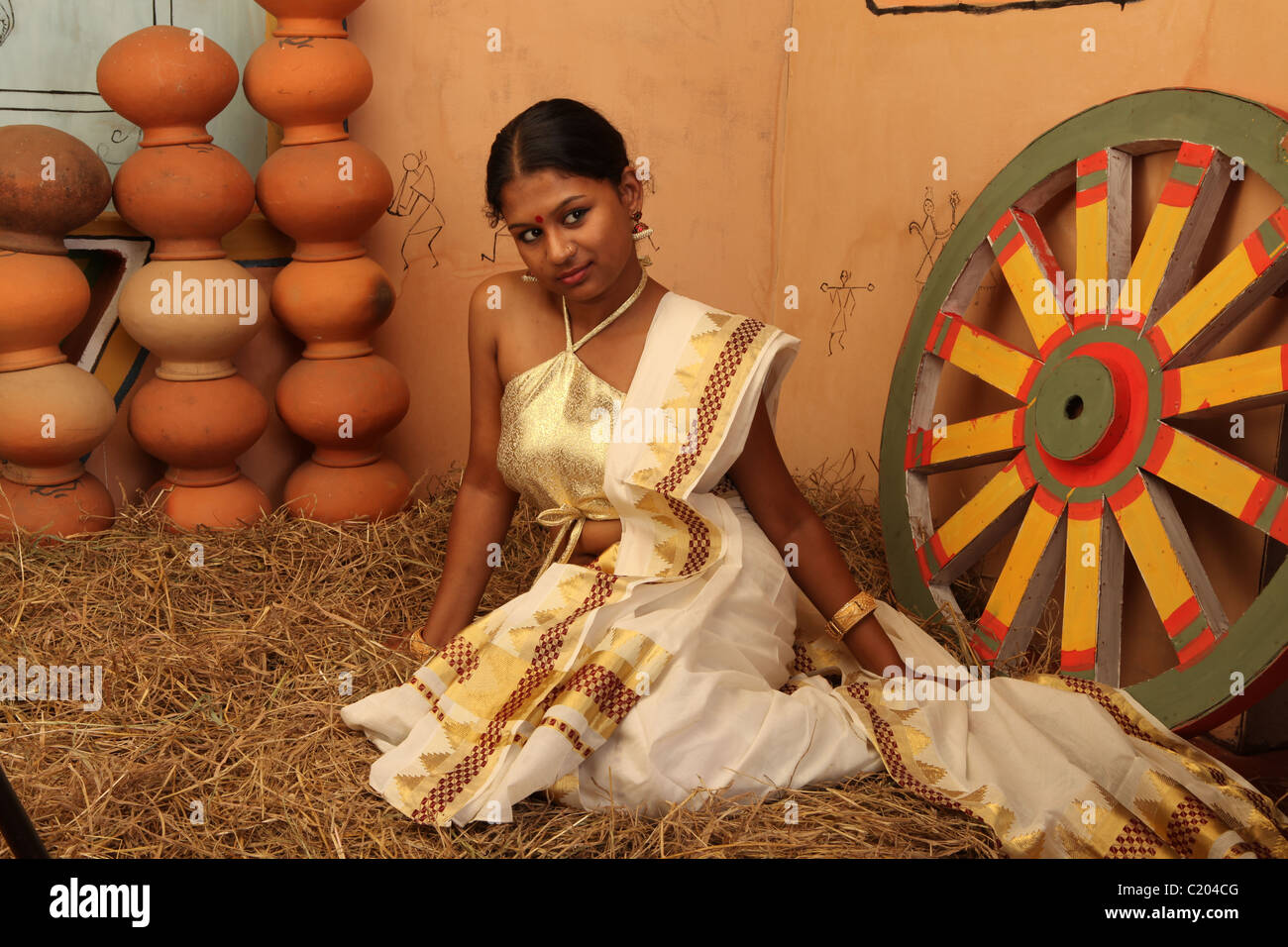 model poses in kerala made costumes,kasavu mundu,veshti for a portfolio ...