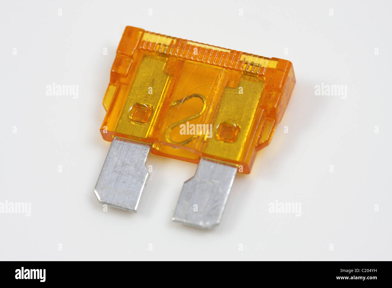 Electrical car auto fuse isolated on a white background Stock Photo - Alamy