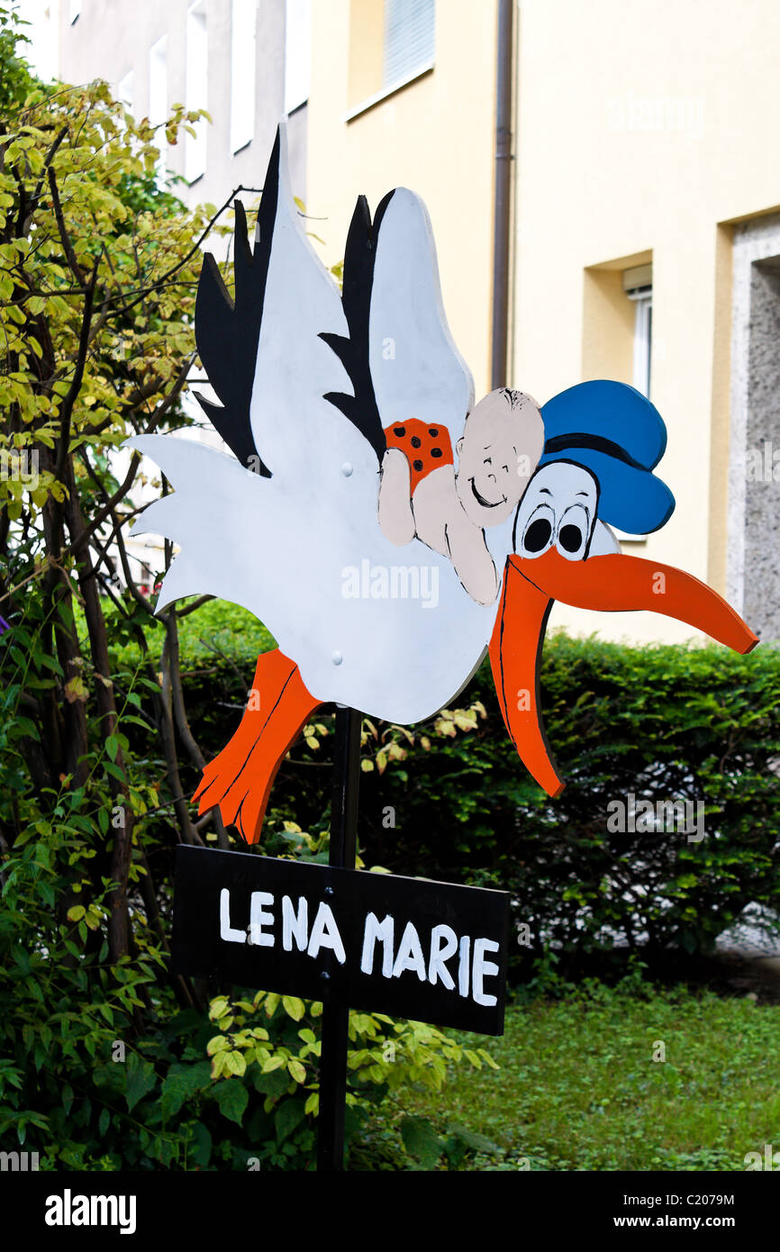 Stork as a symbol of new-born child Stock Photo - Alamy