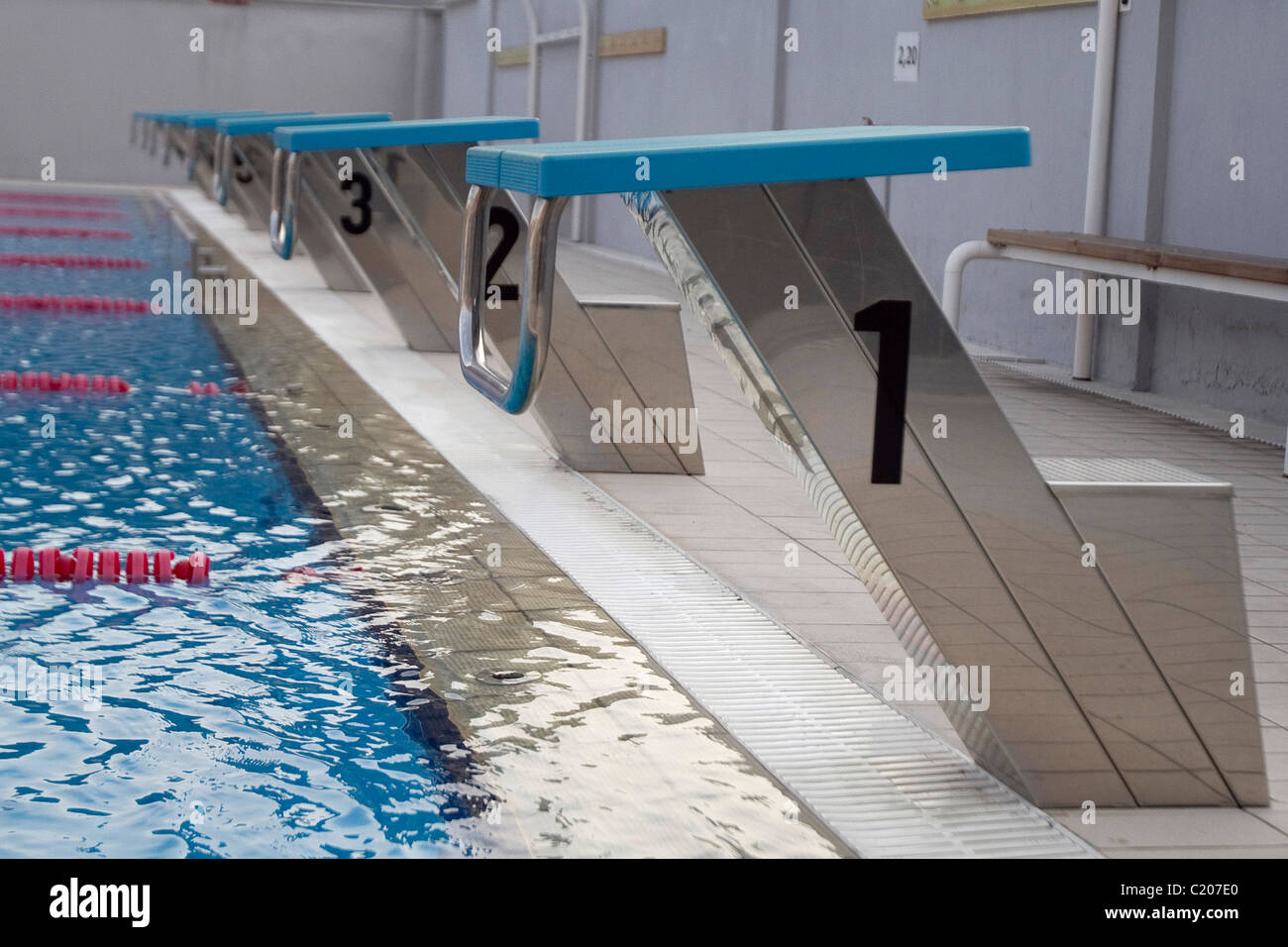 Starting platforms with numbers for swimming races Stock Photo - Alamy