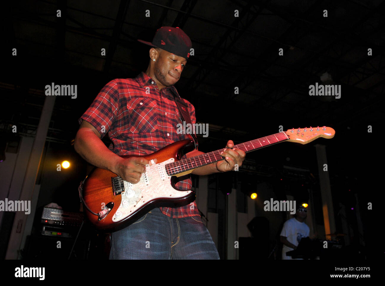 Lead guitarist and Pharrell Williams performs with his band the N.E.R.D ...