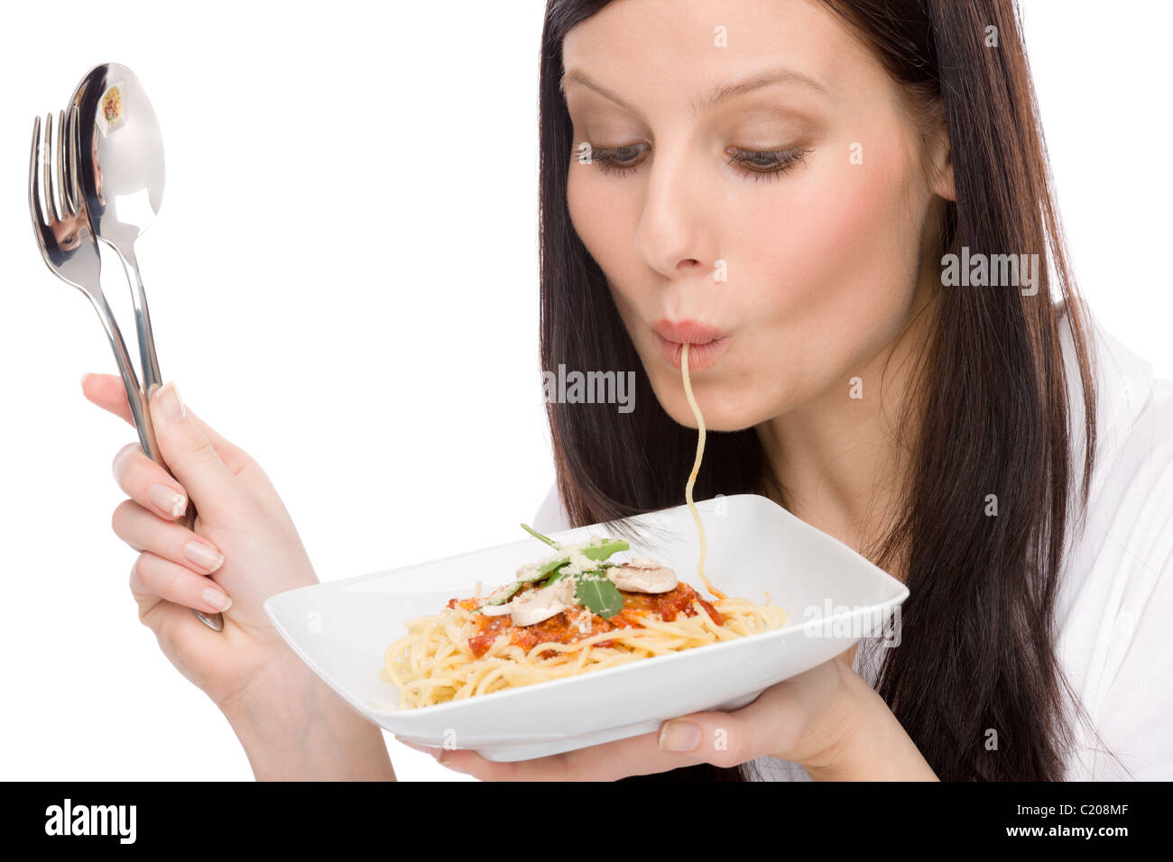 Italian food - portrait of healthy woman eat spaghetti with sauce Stock ...