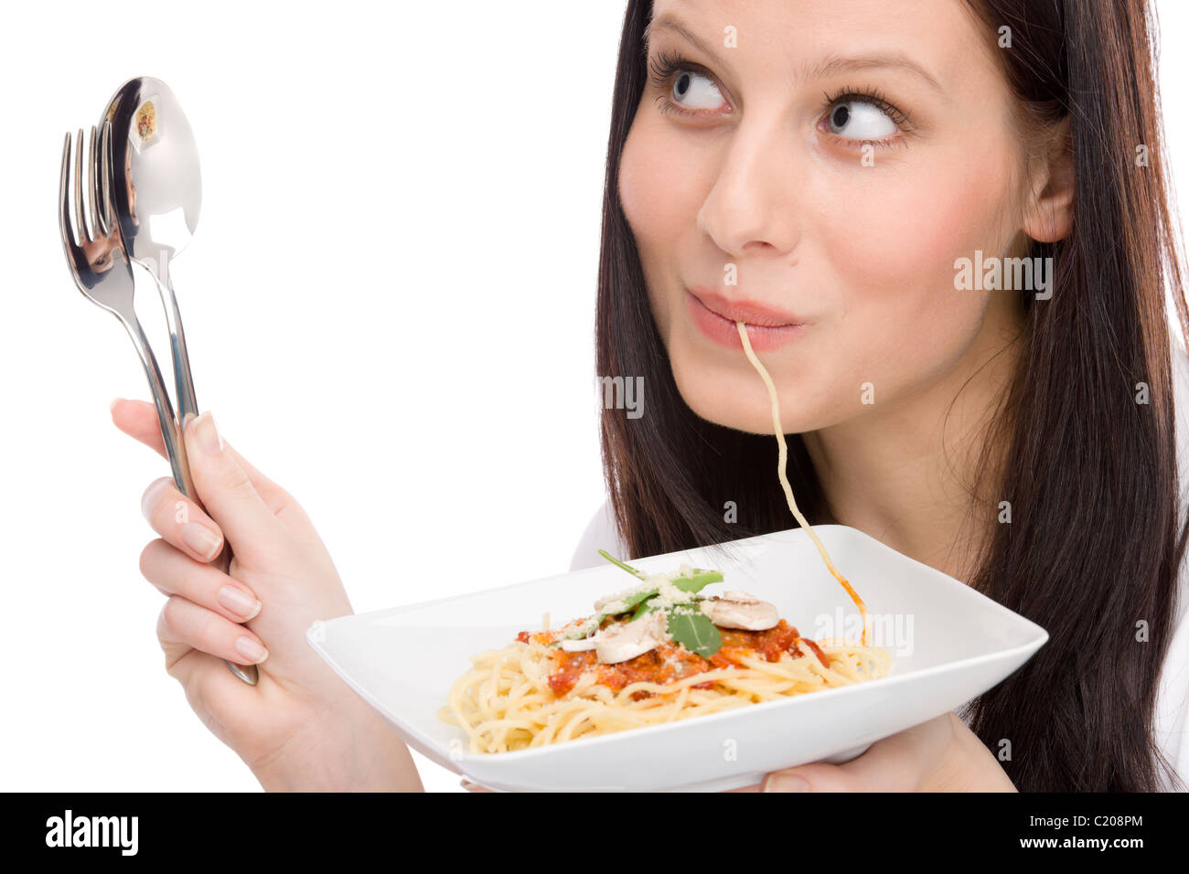 Italian food - portrait of healthy woman eat spaghetti with sauce Stock ...