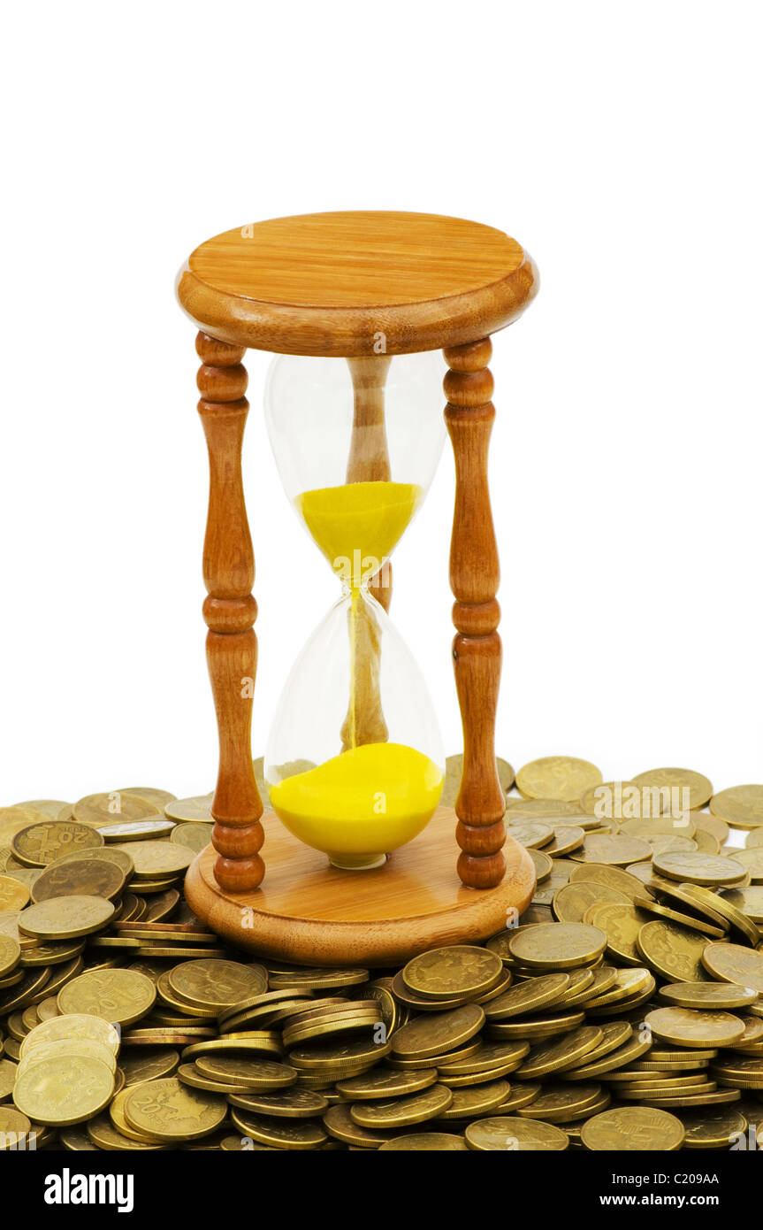 Time is money concept - hourglass and coins Stock Photo - Alamy