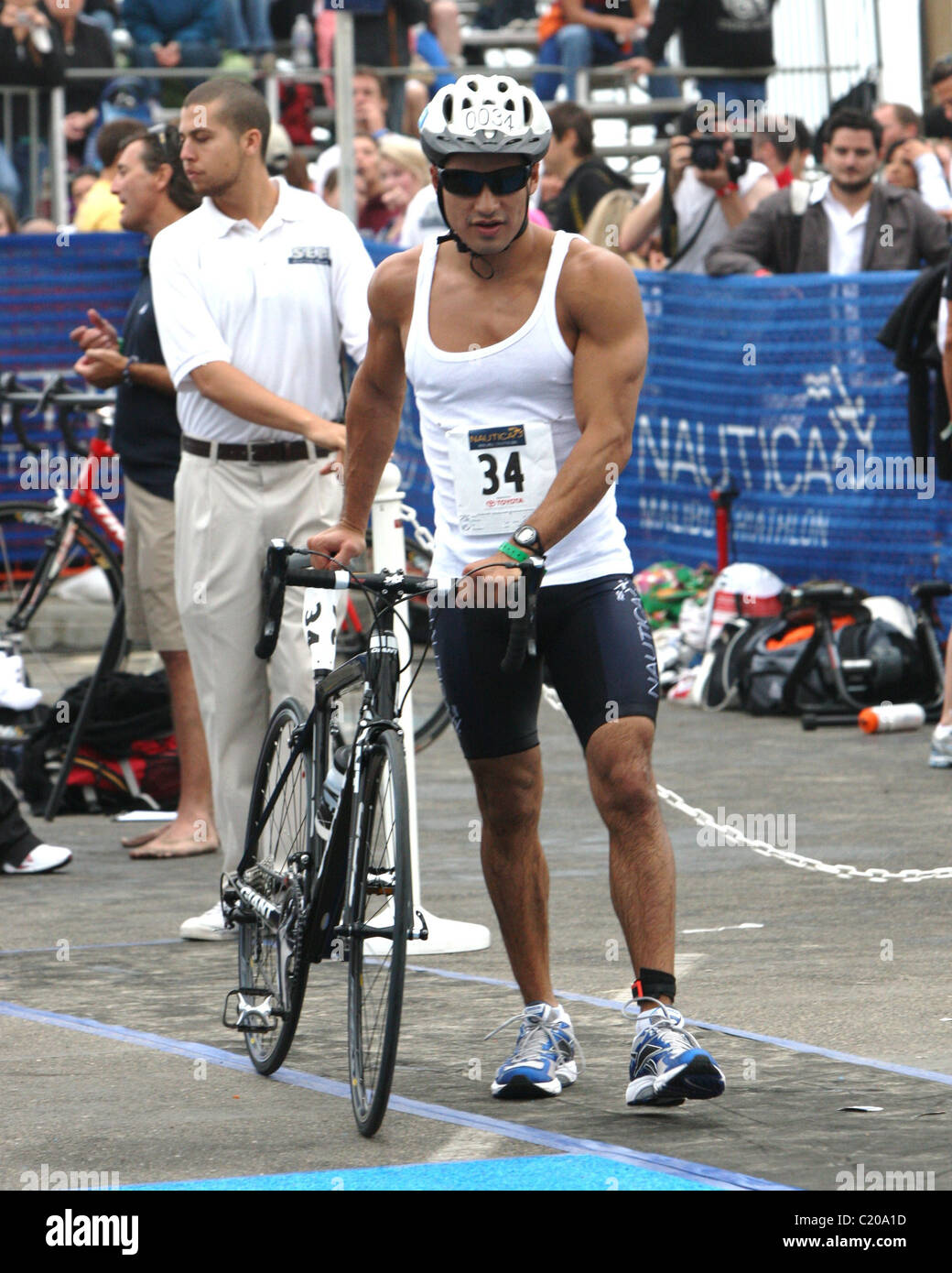 Paparazzi sunglasses bike helmet hi-res stock photography and images ...