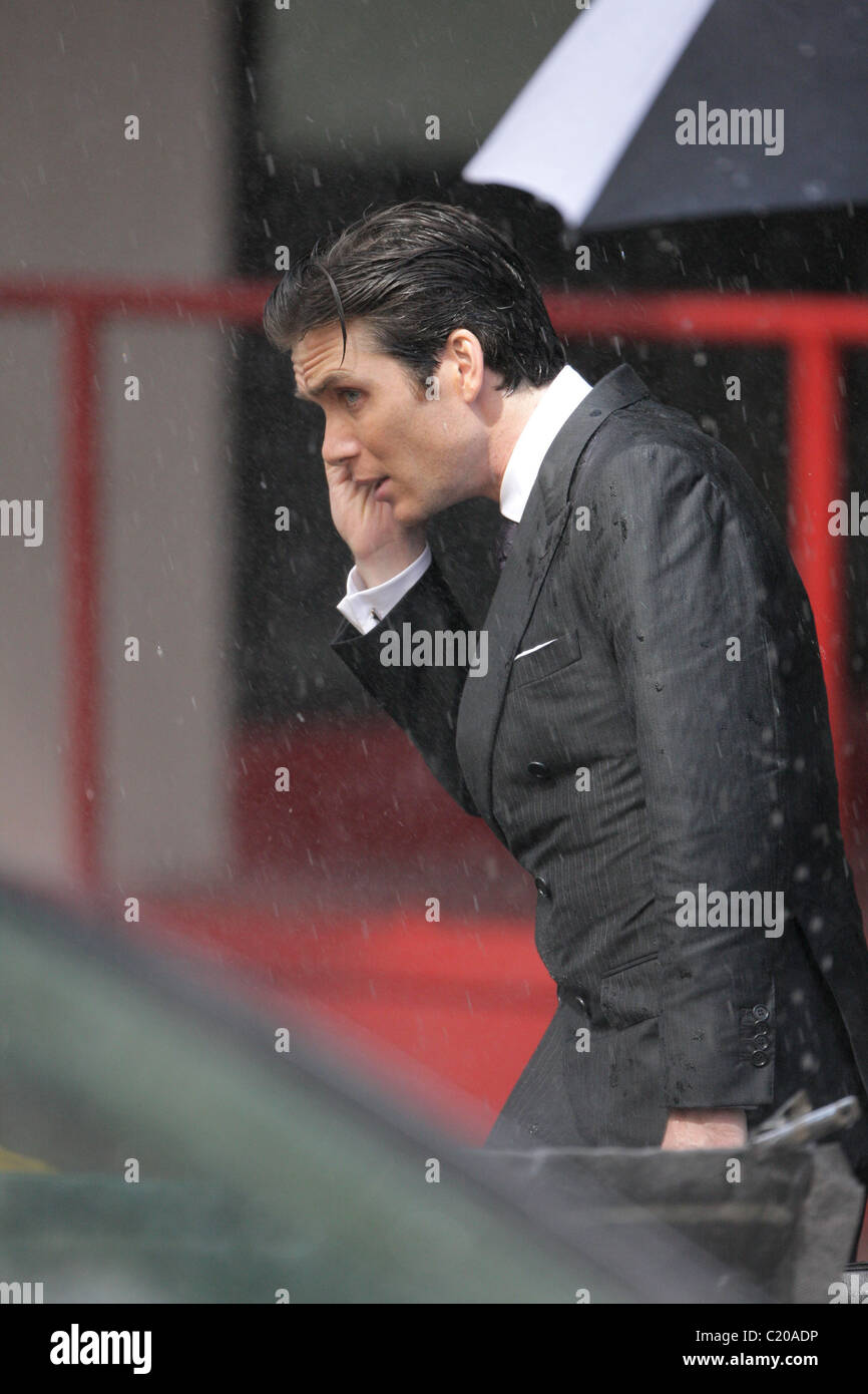 Cillian Murphy shoots a scene in the rain on the set of his new movie ...