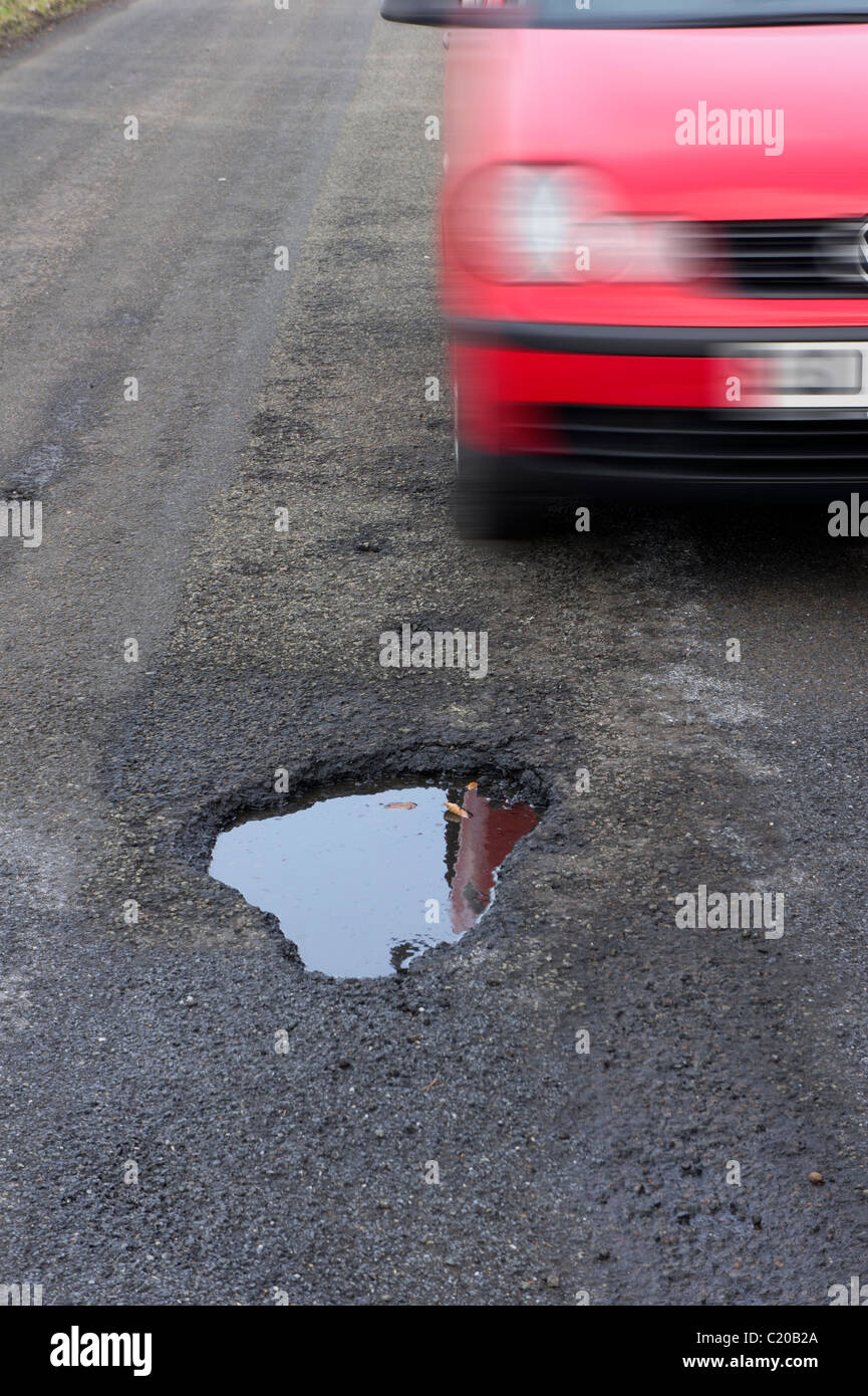 Dangerous pothole hi-res stock photography and images - Alamy