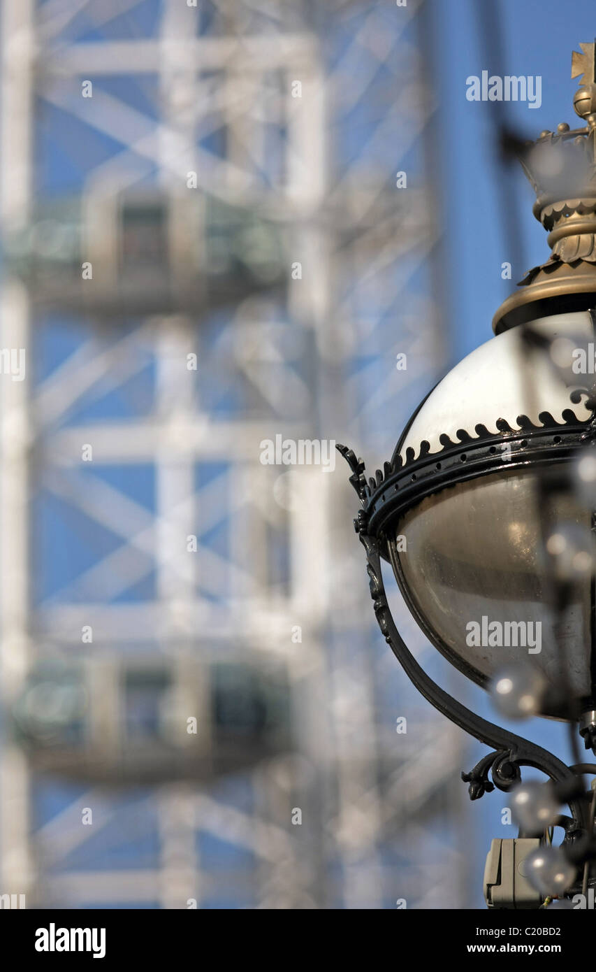 Part of a street light on the embankment of the River Thames in London ...