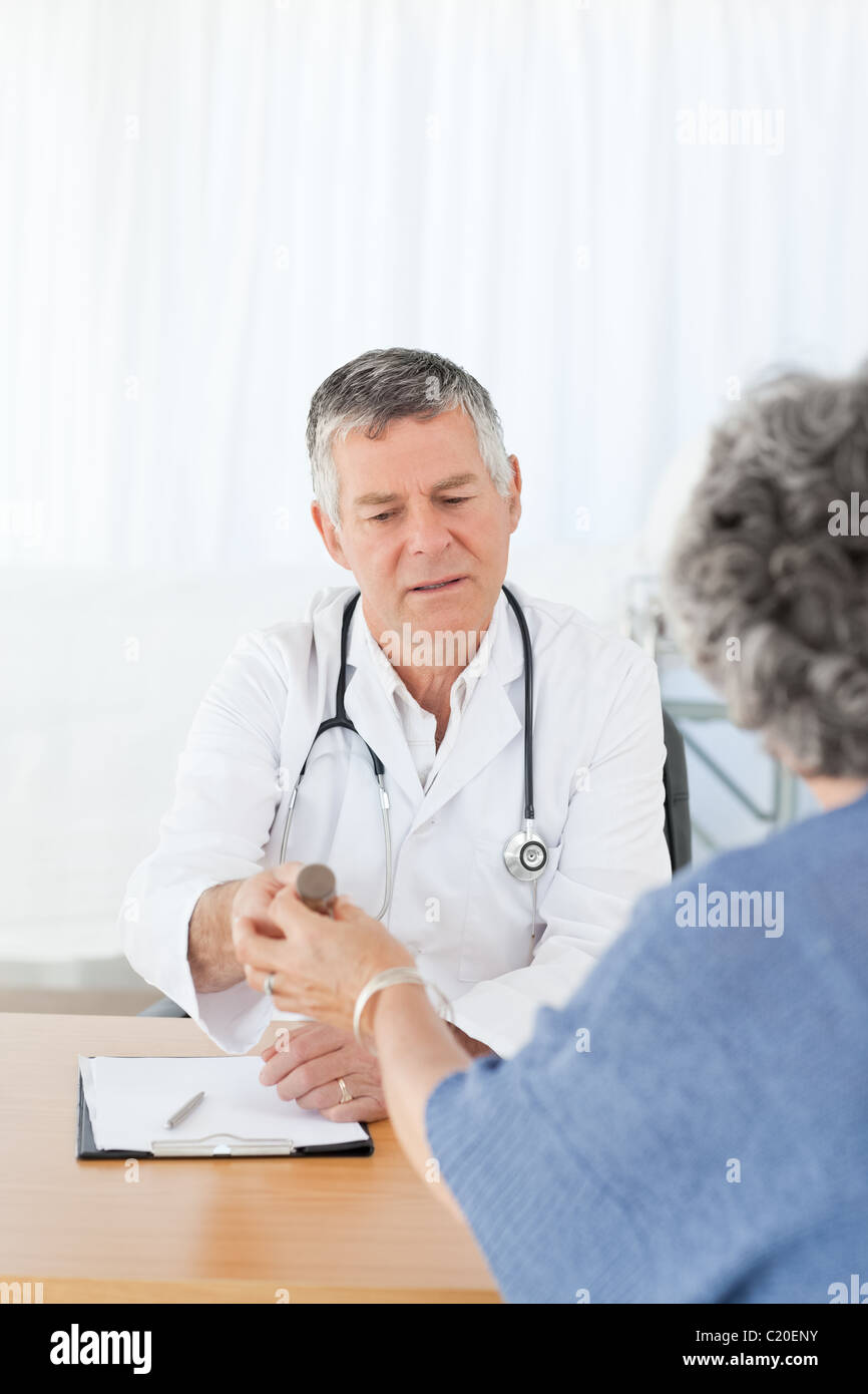 A senior doctor with his patient Stock Photo - Alamy