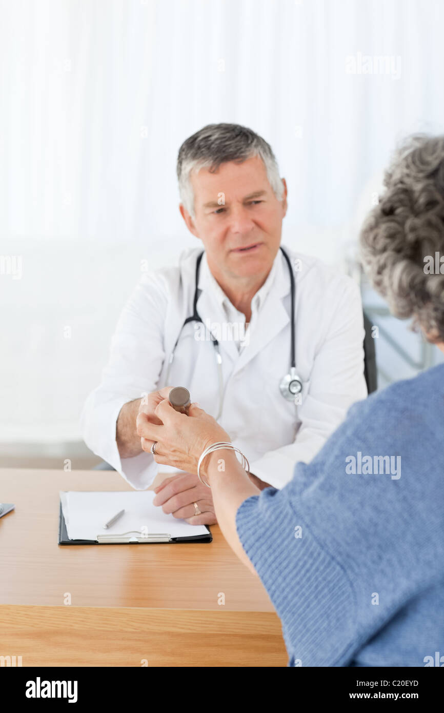 A senior doctor with his patient Stock Photo - Alamy