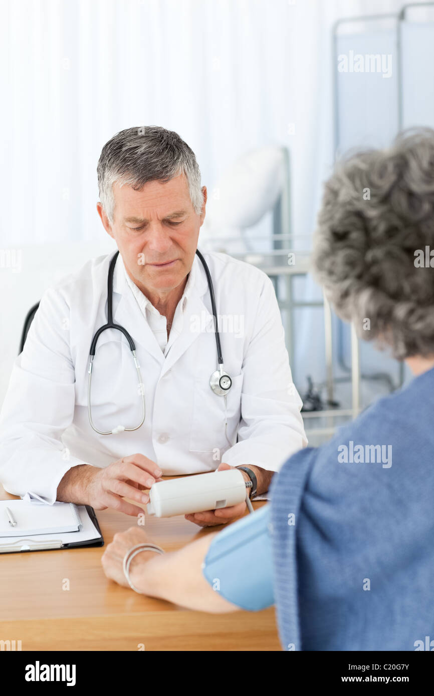 A senior doctor with his patient Stock Photo - Alamy
