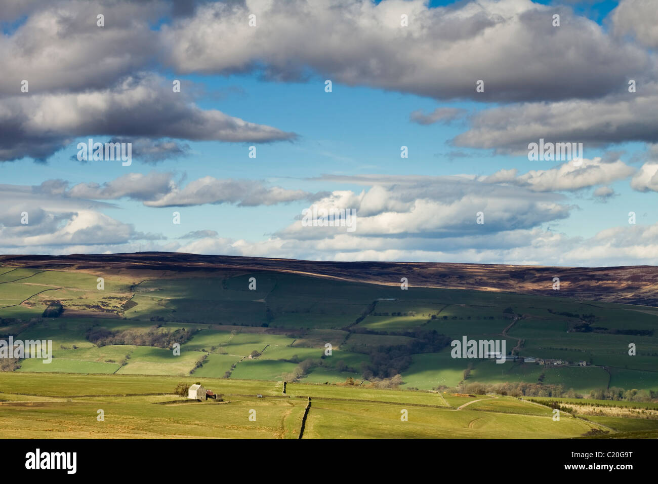 Clouds scudding across Harvey Hill on the route of the Weardale Way ...