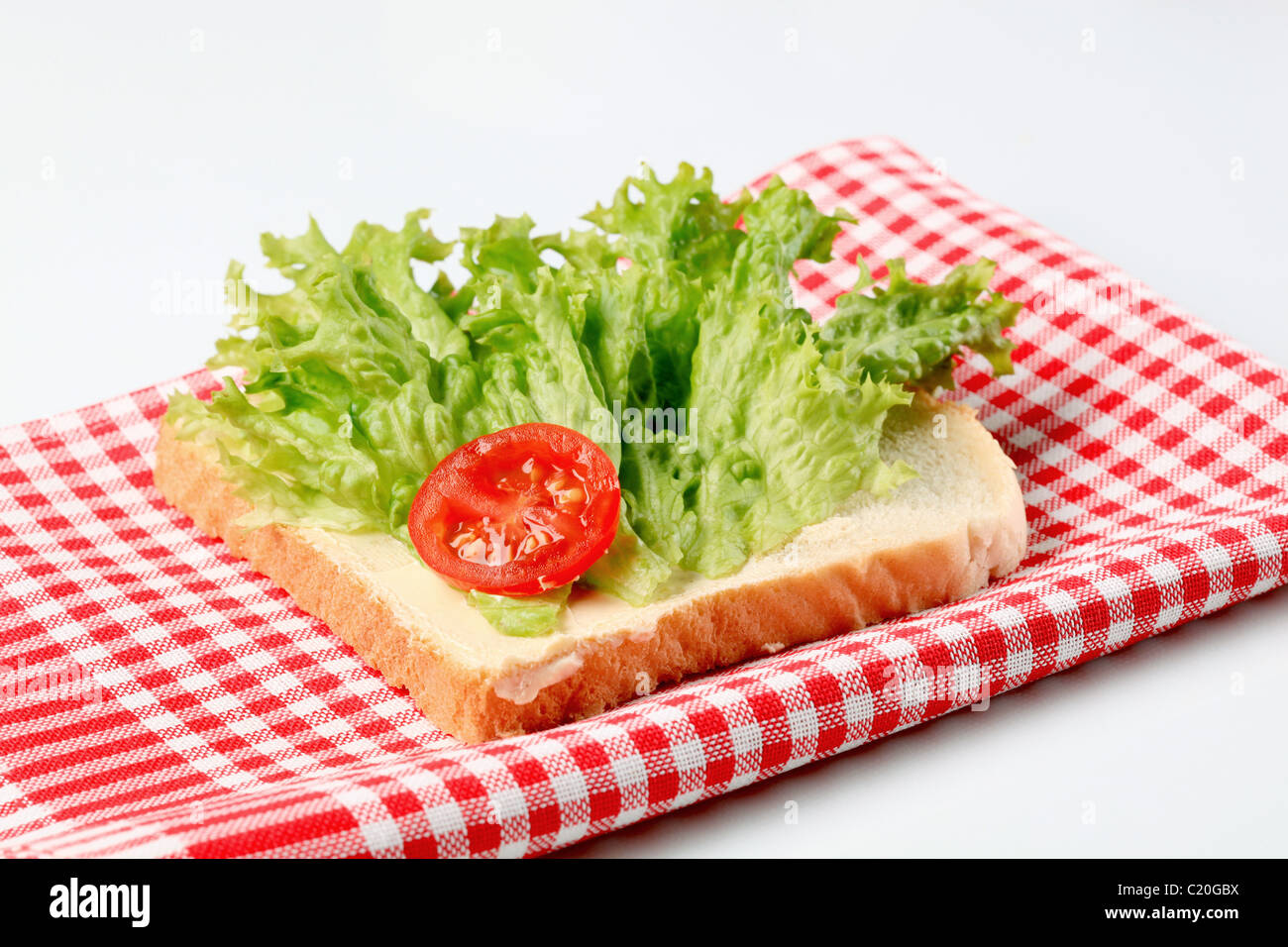 Slice of white bread and lettuce Stock Photo - Alamy