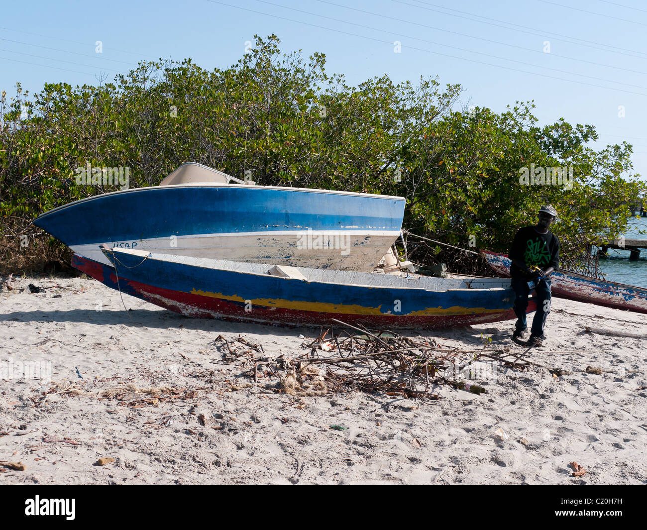 Man with his fishing boats at Denton Bridge, Banjul, The Gambia Stock ...