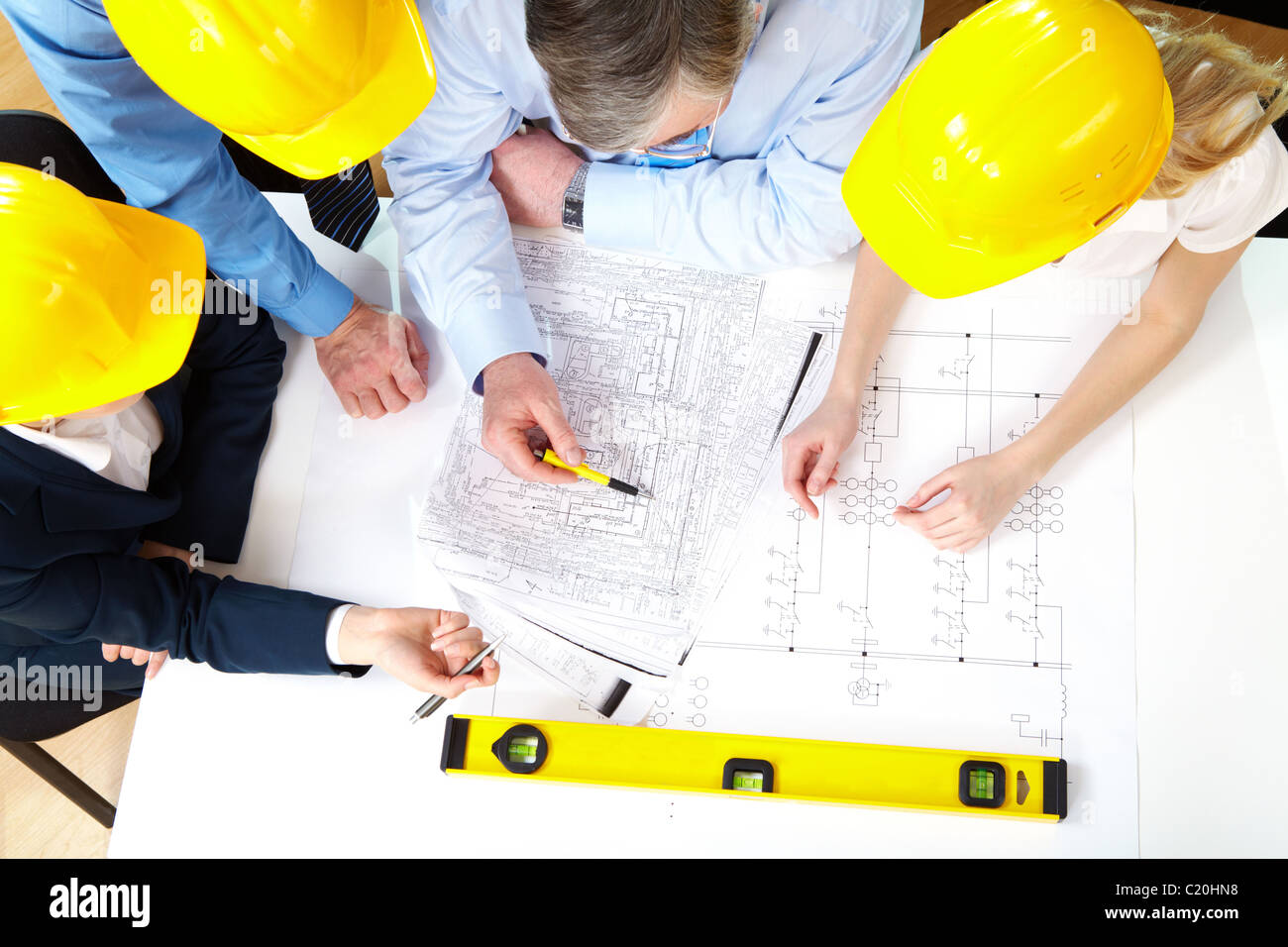 Above view of architects planning a house project Stock Photo - Alamy